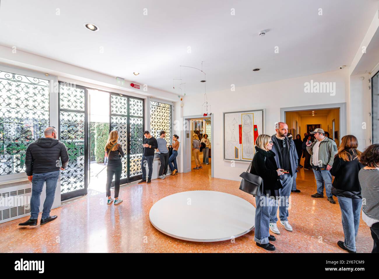 People inside the main lobby at The Peggy Guggenheim museum a palazzo ...