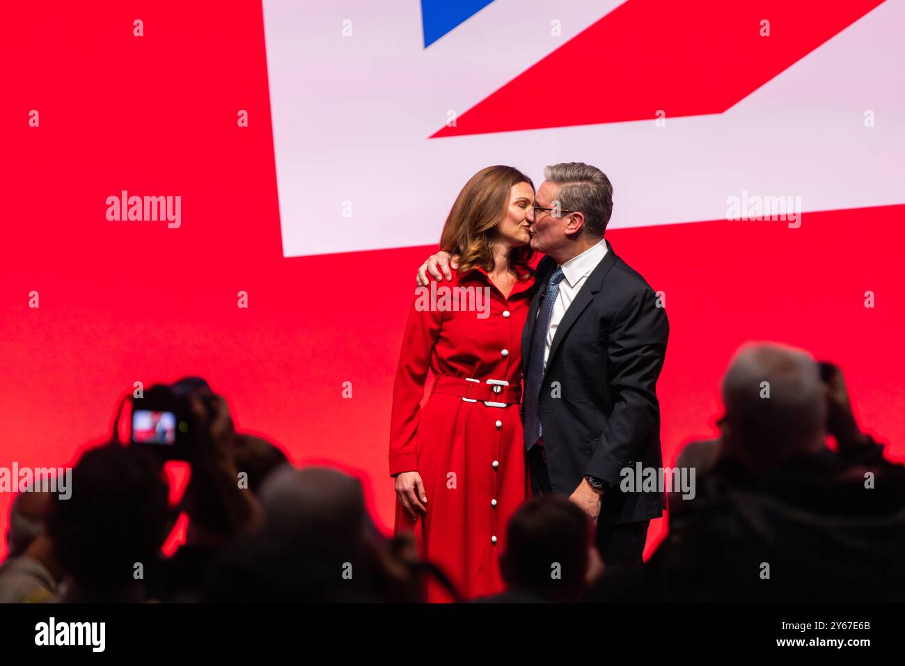 Liverpool, UK. 24 SEP, 2024. Victoria Starmer kisses her PM husband Sir ...