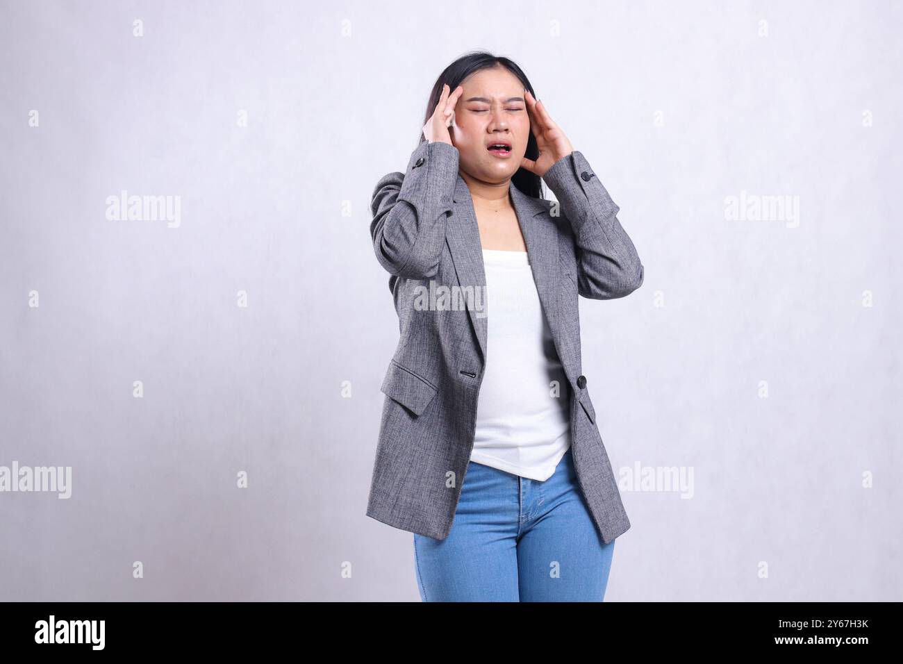 expression of beautiful young office woman dizzy close eyes both hands ...