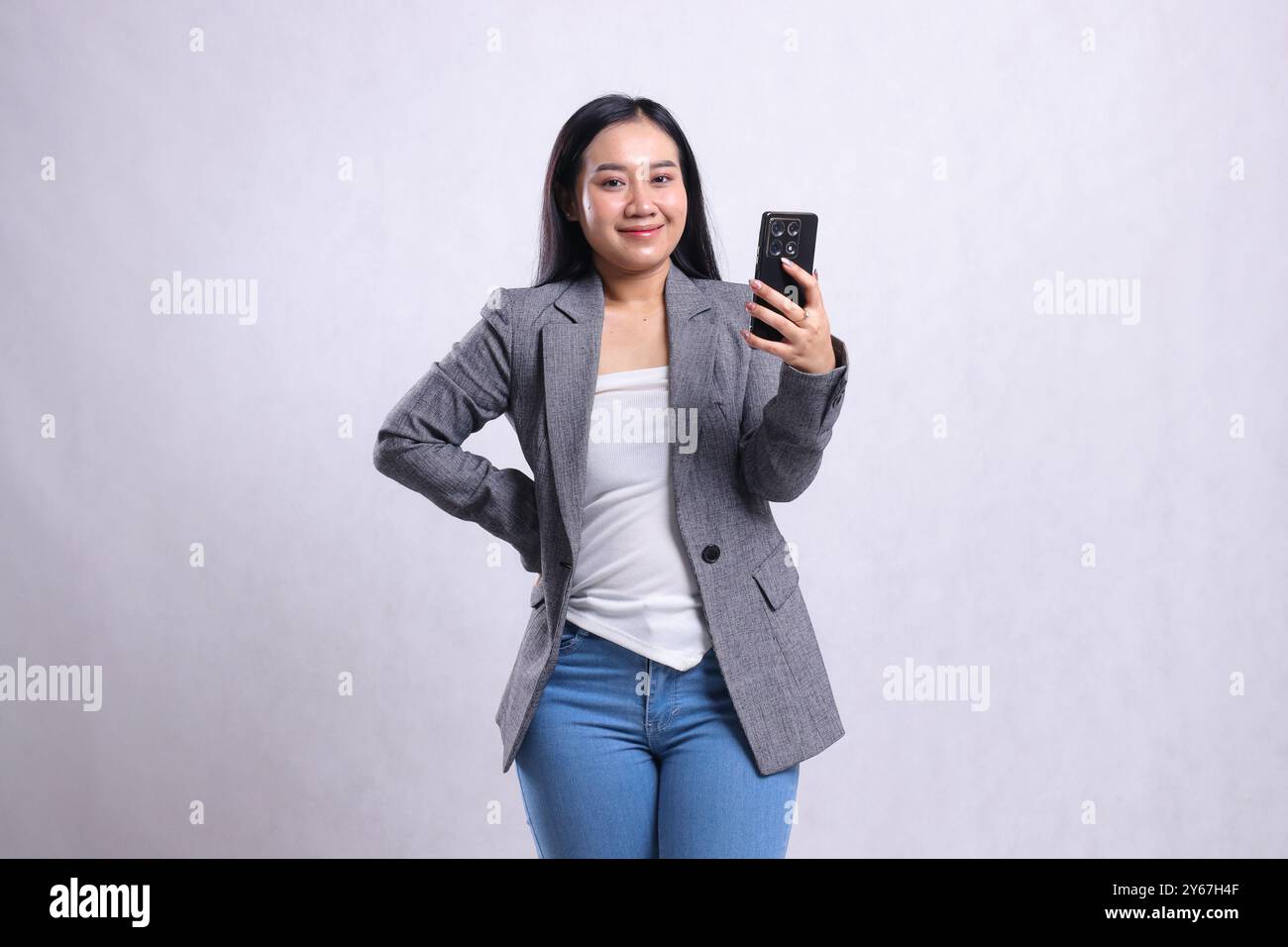 beautiful young office woman asia smile to camera hold waist, holding ...