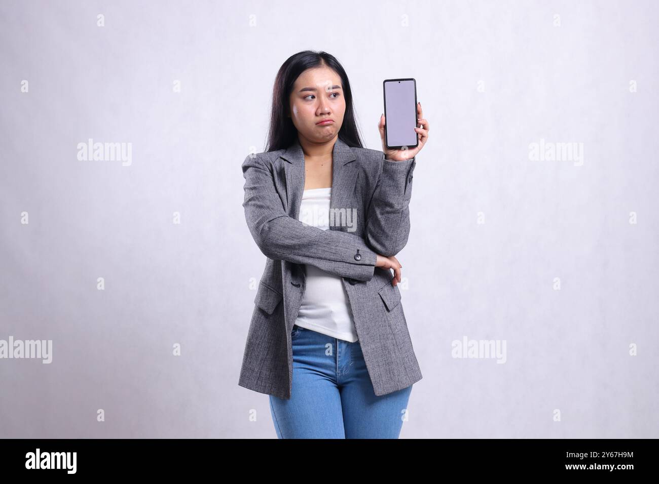 gesture beautiful office lady pouting to mobile phone arms crossed ...