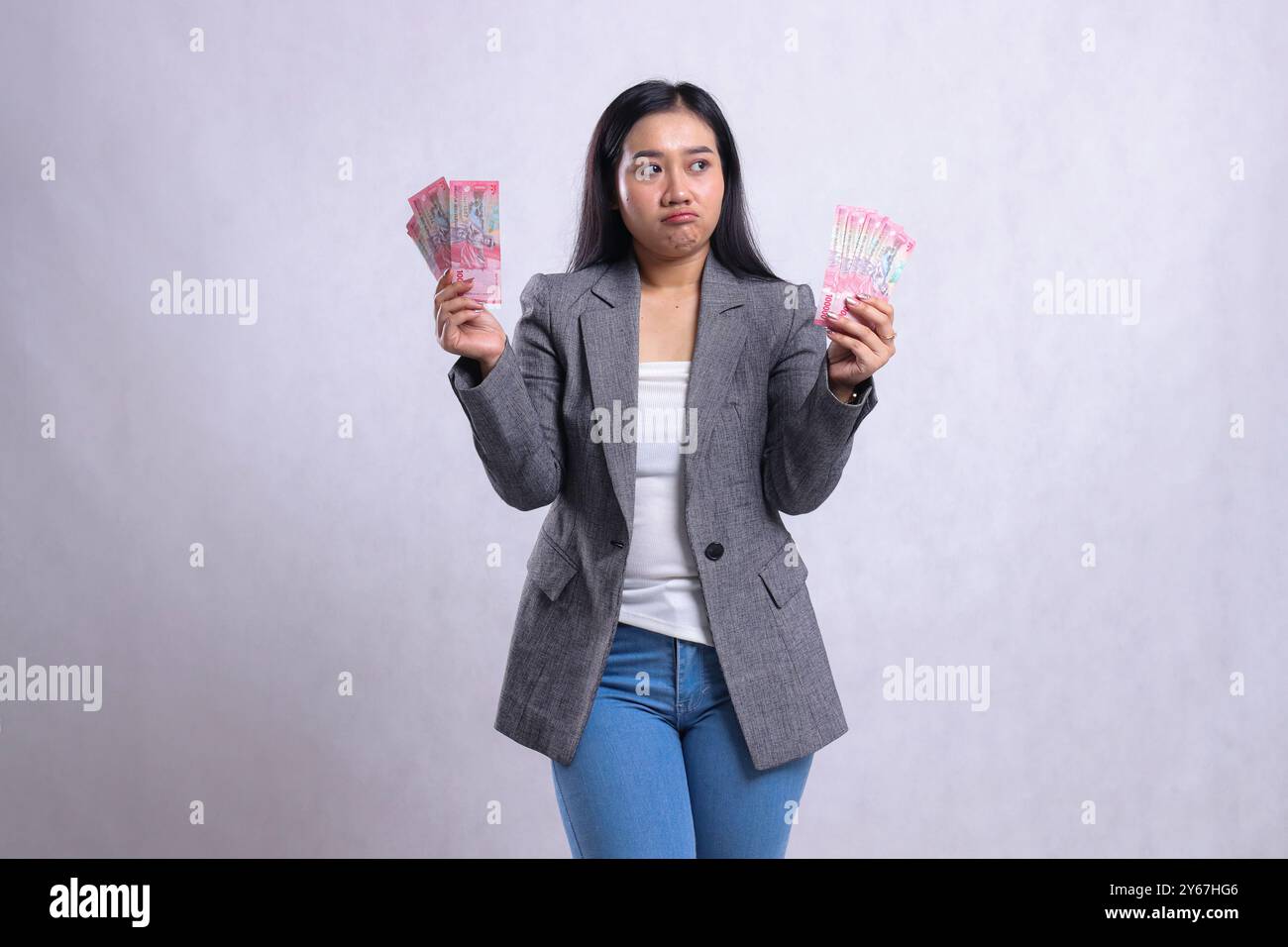 beautiful young office lady asia pouting candid both hands spread hold ...