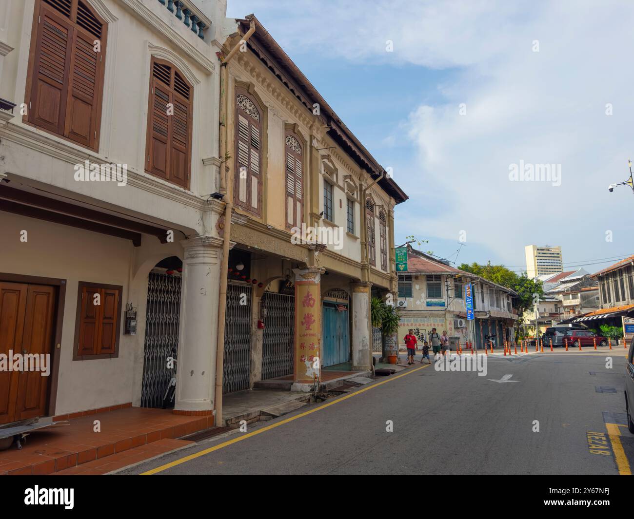 Historic commercial buildings on Lorong Hang Jebat Street in city center of Melaka, Malaysia ...