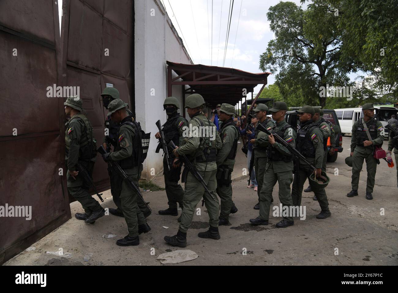 FILE - Soldiers raid the Tocorón Penitentiary Center, in Tocorón ...