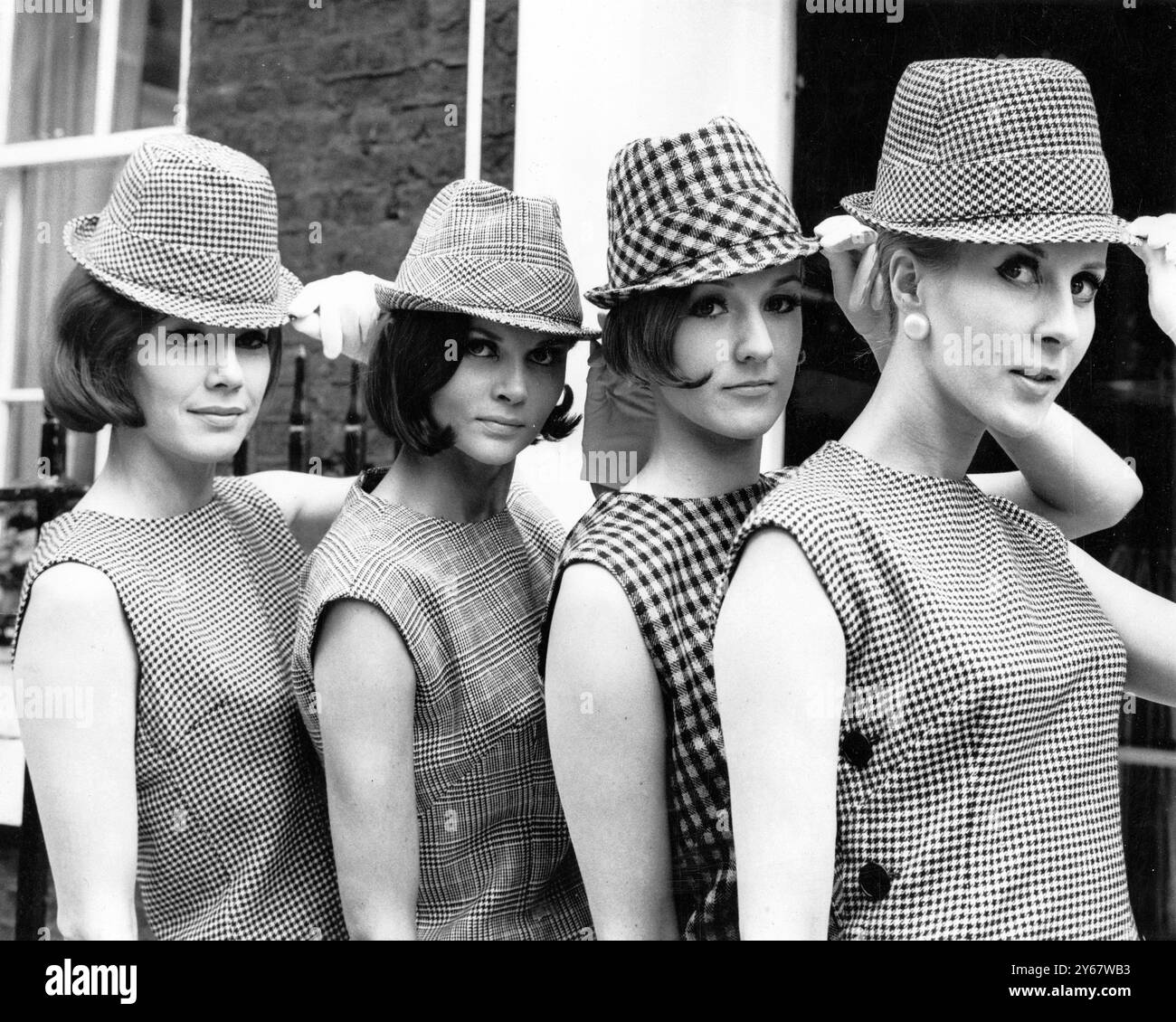 The Trilby Troupe modelling tweed triilbies hats 1964 Stock Photo - Alamy