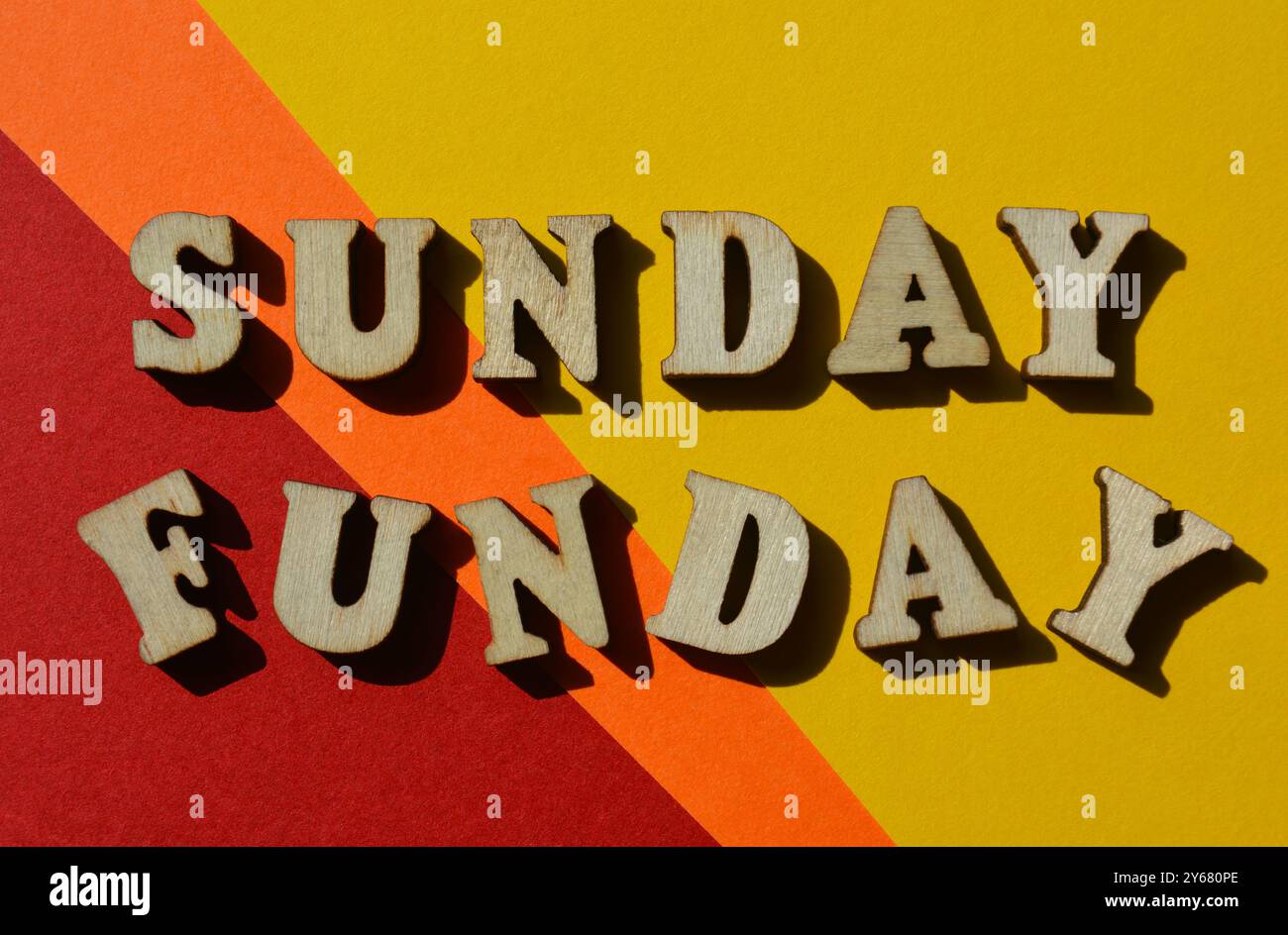 Sunday Funday, phrase in wooden alphabet letters isolated as banner ...