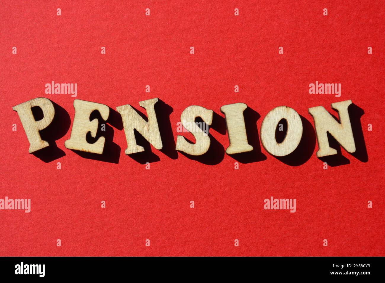Pension, word in wooden alphabet letters isolated onred background ...
