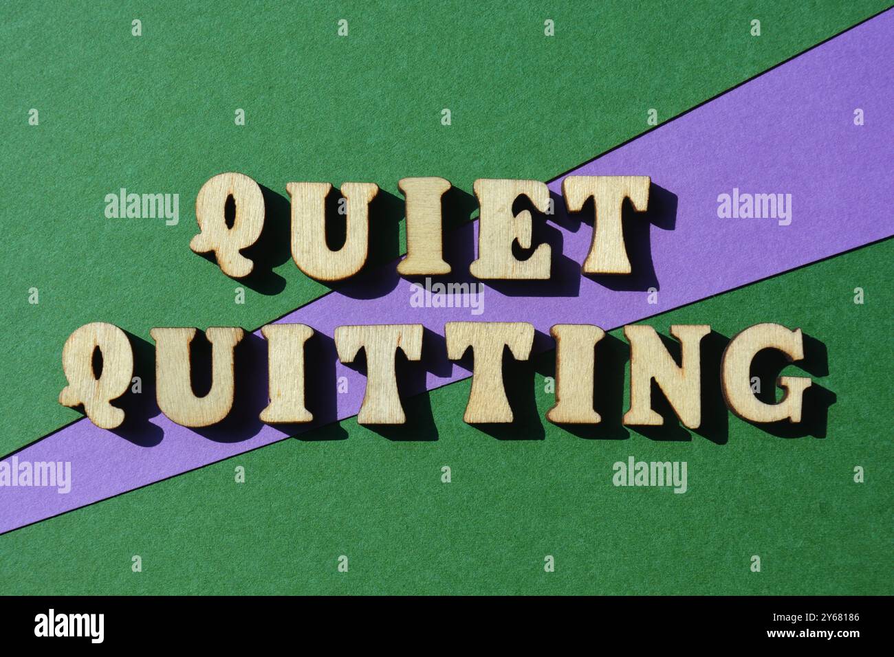 Quiet Quitting, words in wooden alphabet letters isolated on background ...
