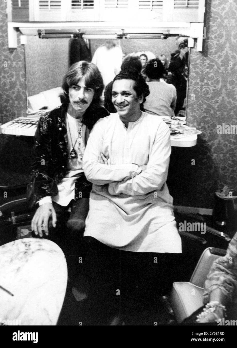 George Harrison with Ravi Shankar backstage at the Hollywood bowl ...