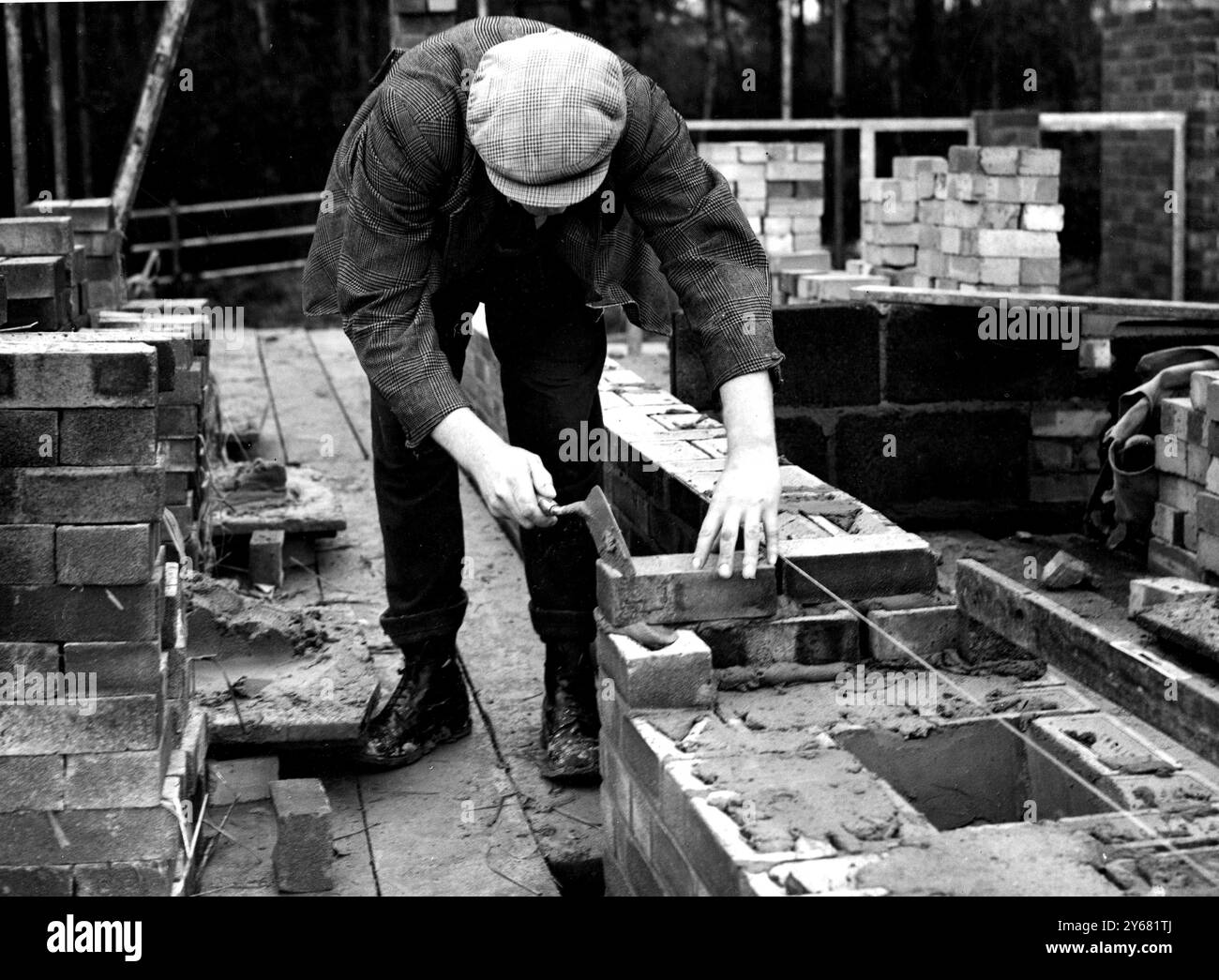 Bricklaying brick Black and White Stock Photos & Images - Alamy