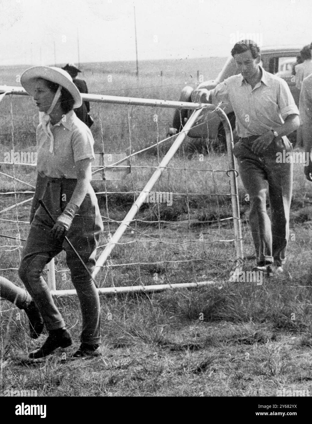 London: Group captain Townsend follows Princess Margaret, who wears ...