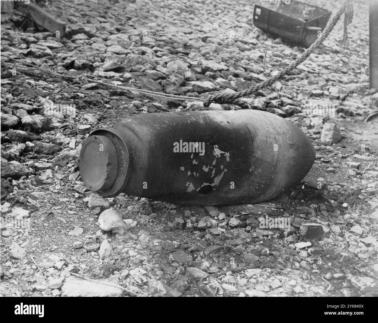 An unexploded shell from the second world war is washed up from the ...