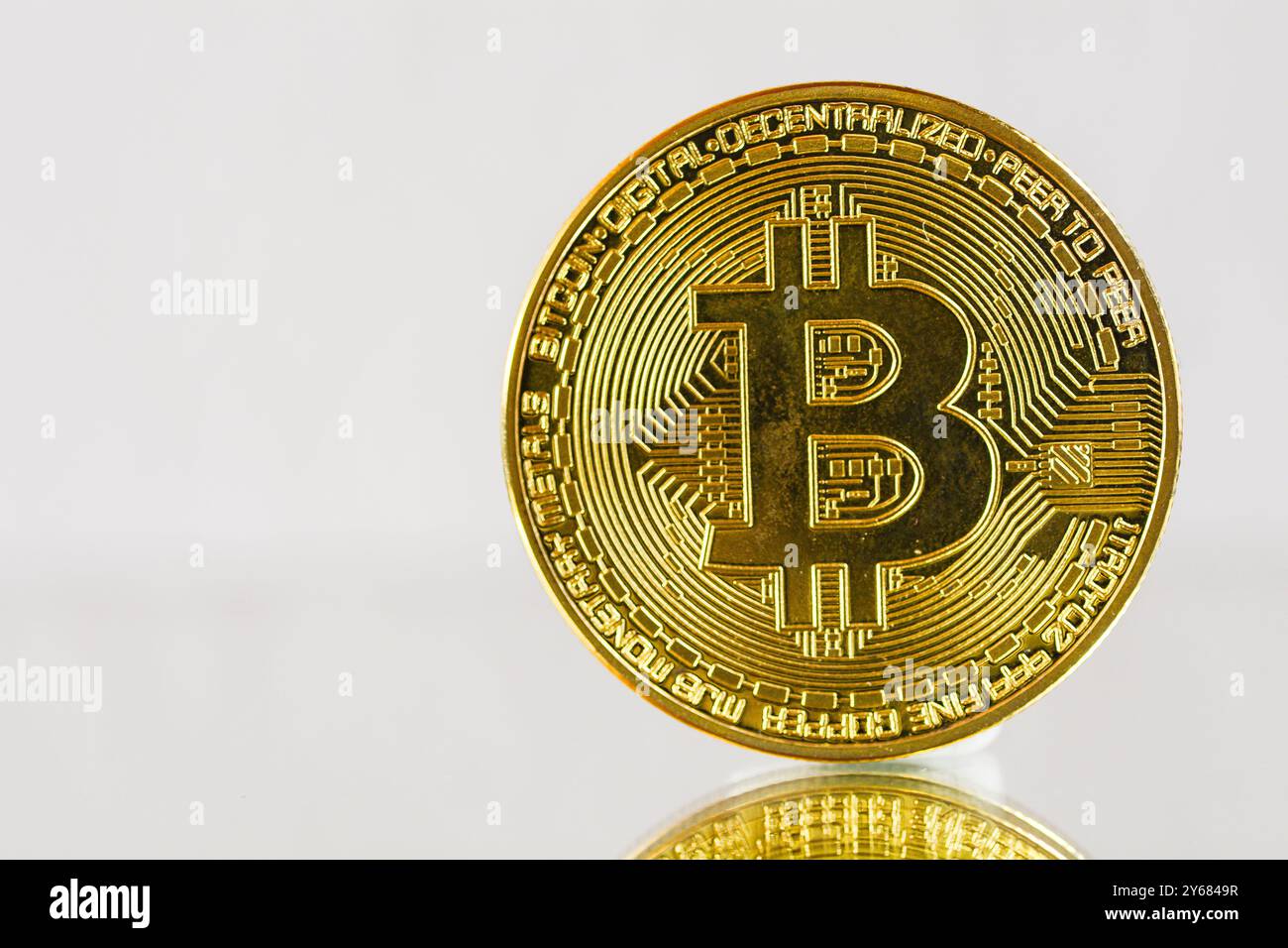 Concept picture of a physical bitcoin coin isolated Stock Photo - Alamy