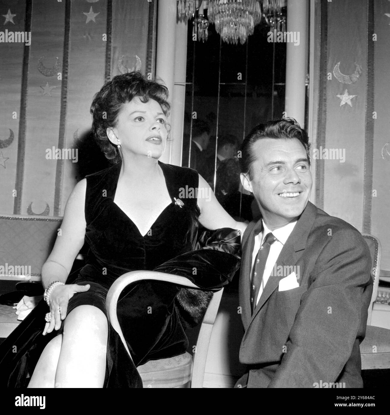 Renowned American singing star Judy Garland is pictured with British actor Dirk Bogarde at this ...