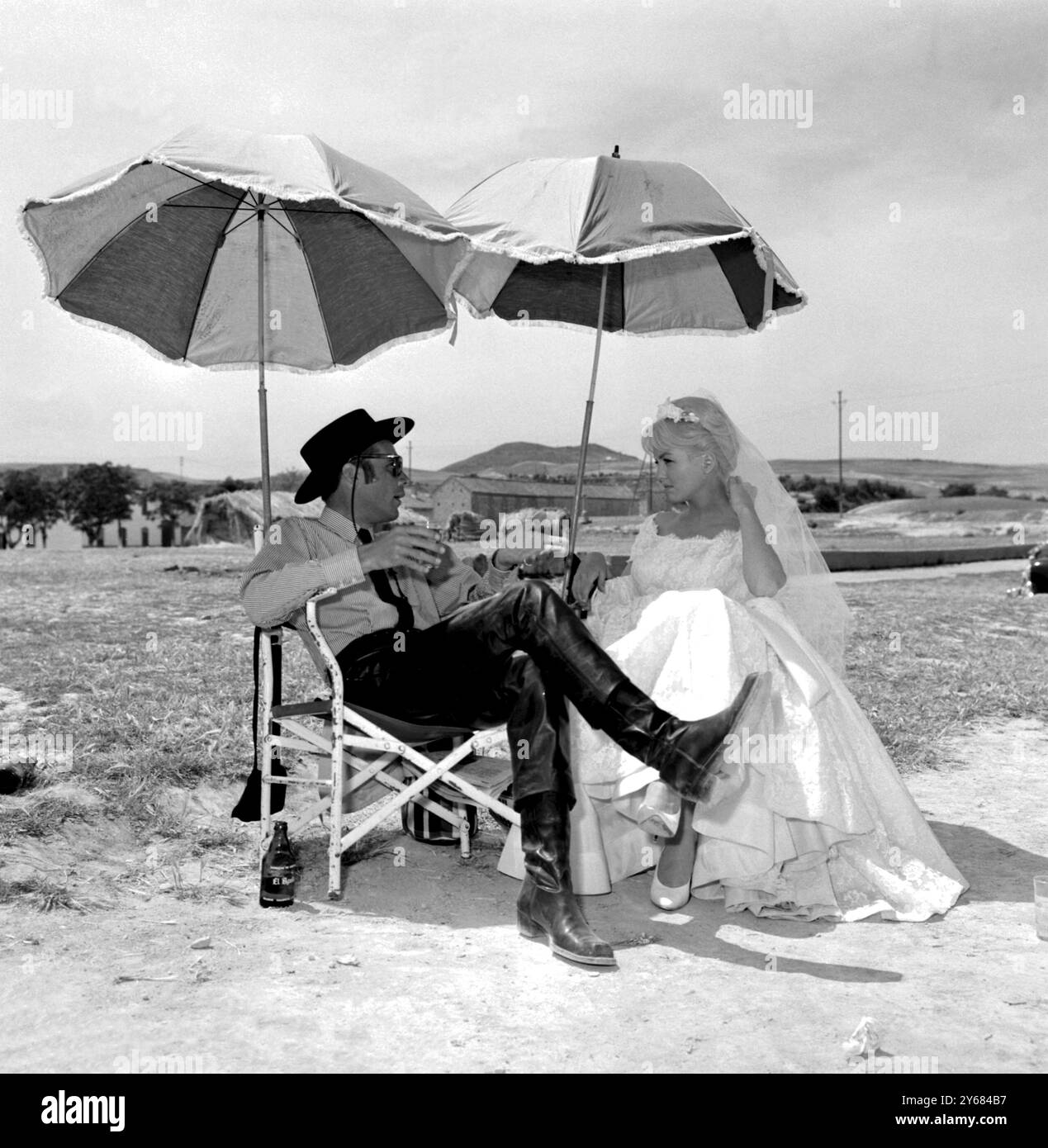 This shady scene is at Gabia in Spain, as with a drink in his hand, the ...