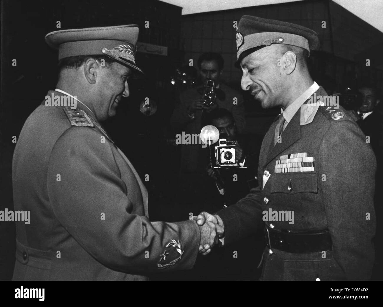 Belgrade, Yugoslavia: President Welcomes King. President Tito (left) is ...
