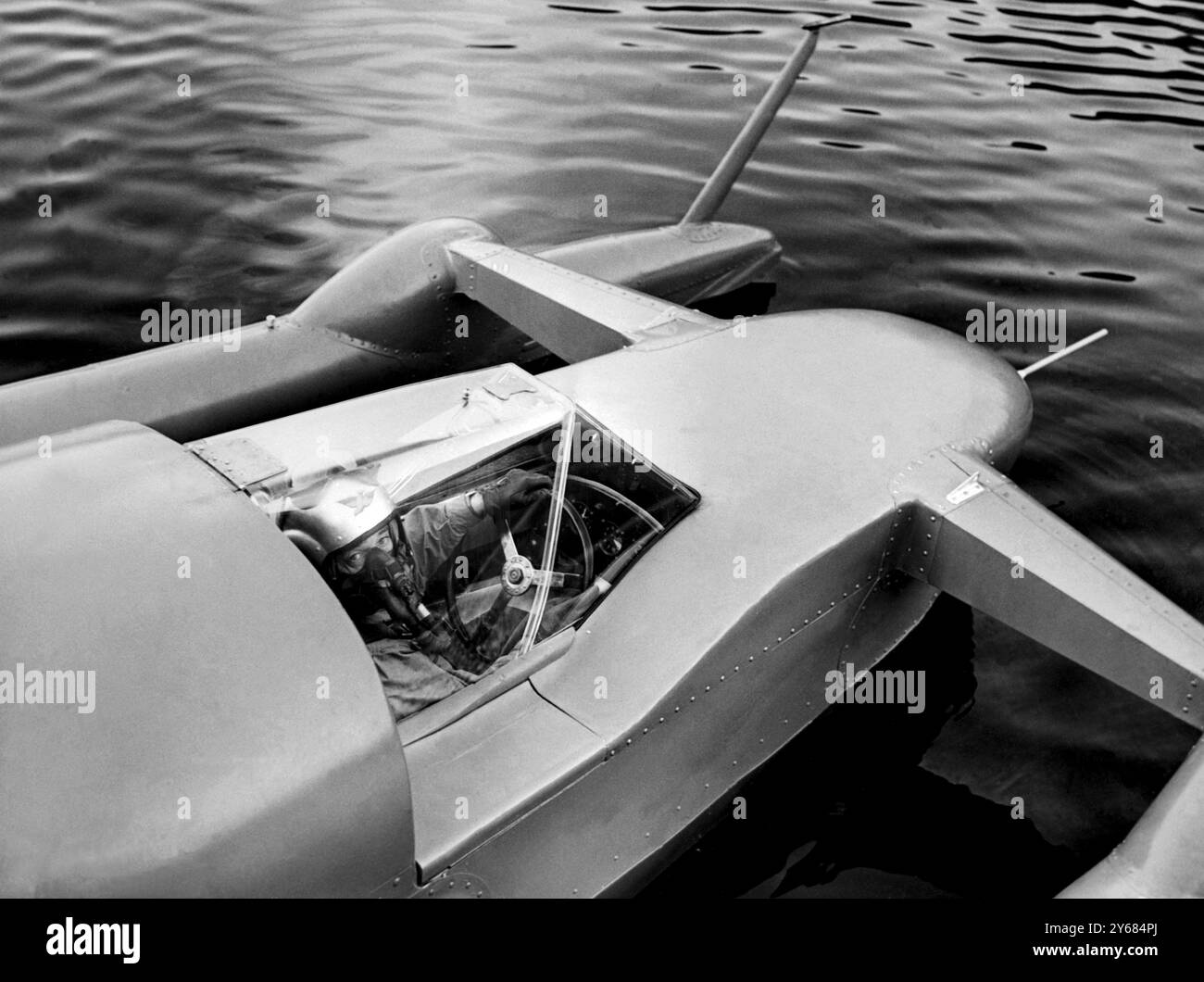 Mr Donald Campbell sits in the cockpit of his Turbo-jet propelled ...