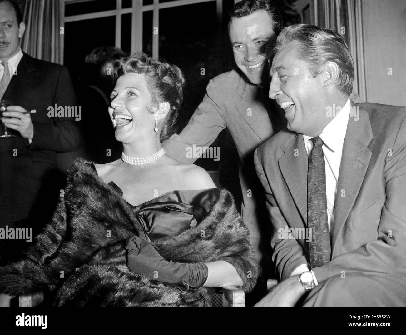 Slow talking tough guy of the American screen Robert Mitchum shares a ...