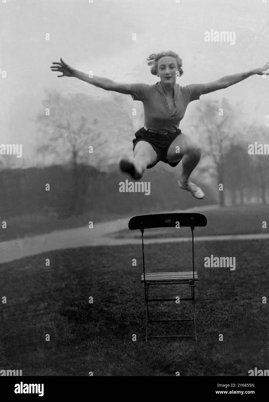 Jumping hurdle Black and White Stock Photos & Images - Alamy
