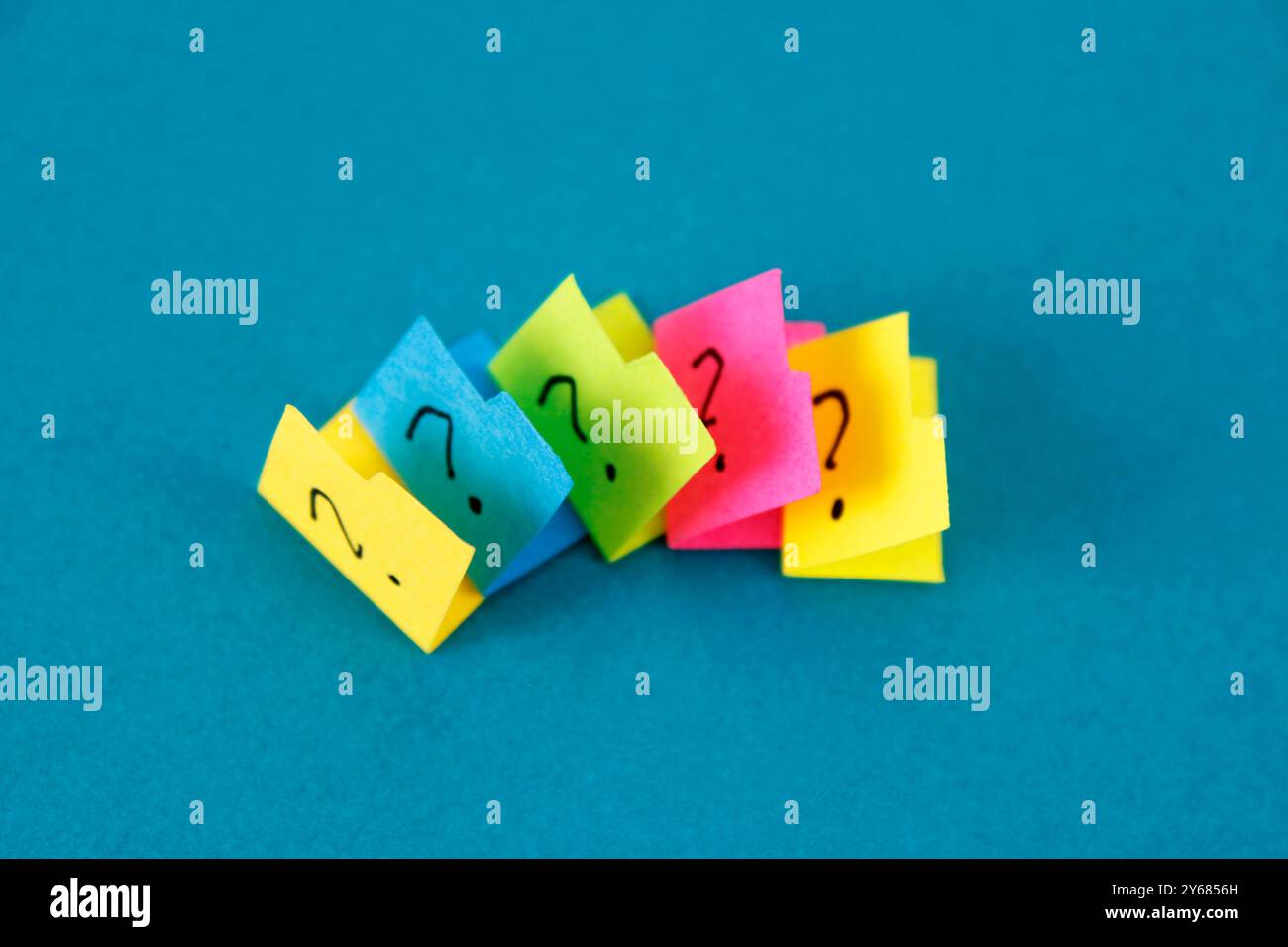 Question marks on colorful folders Stock Photo - Alamy