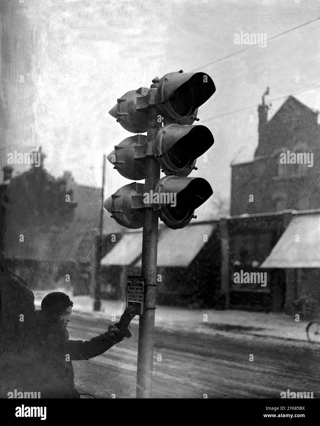 A woman testing out the new pedestrian traffic signals at Croydon ...