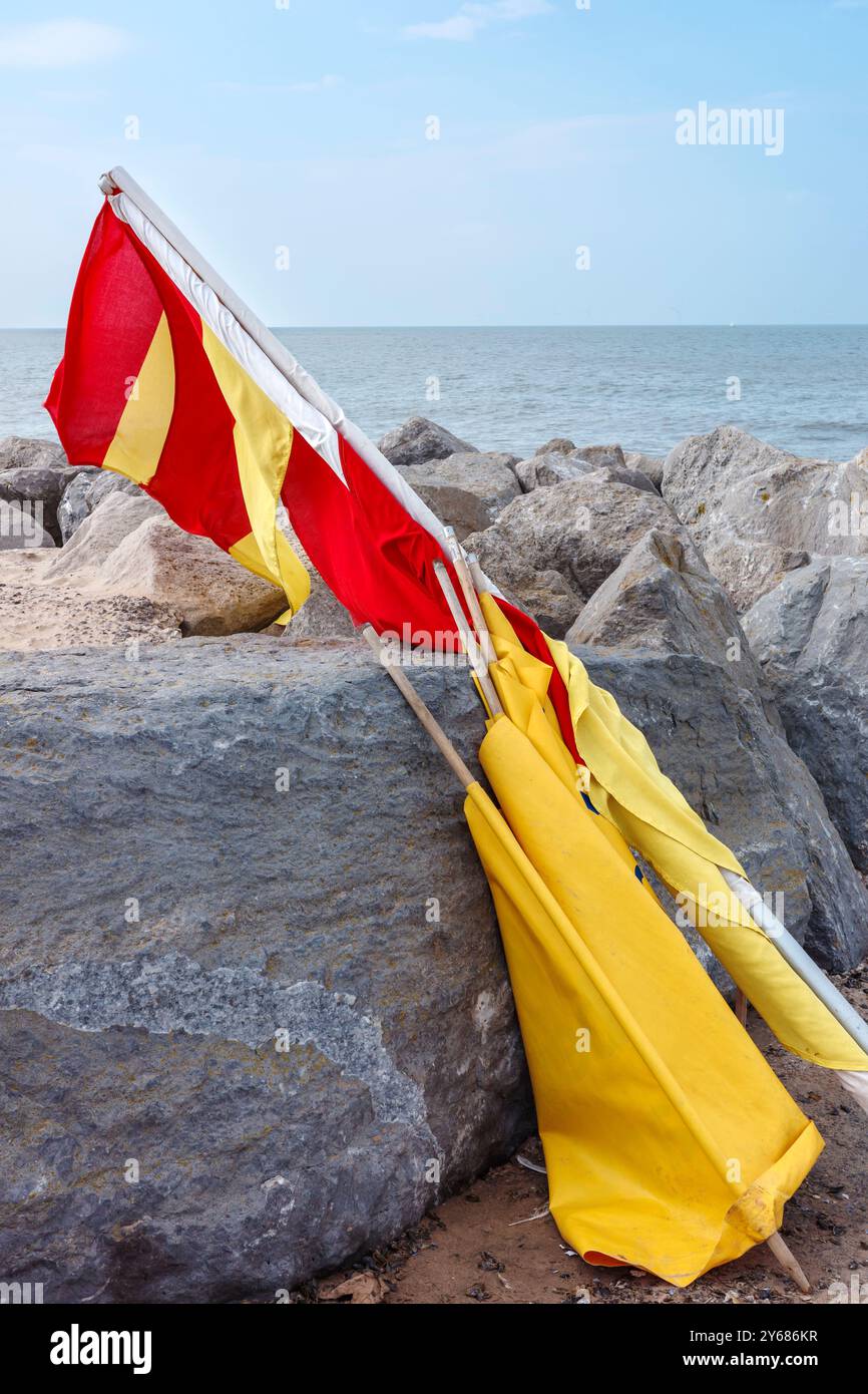 New Brighton, Wallasey, UK, September, 21, 2024: Beach caution flags ...