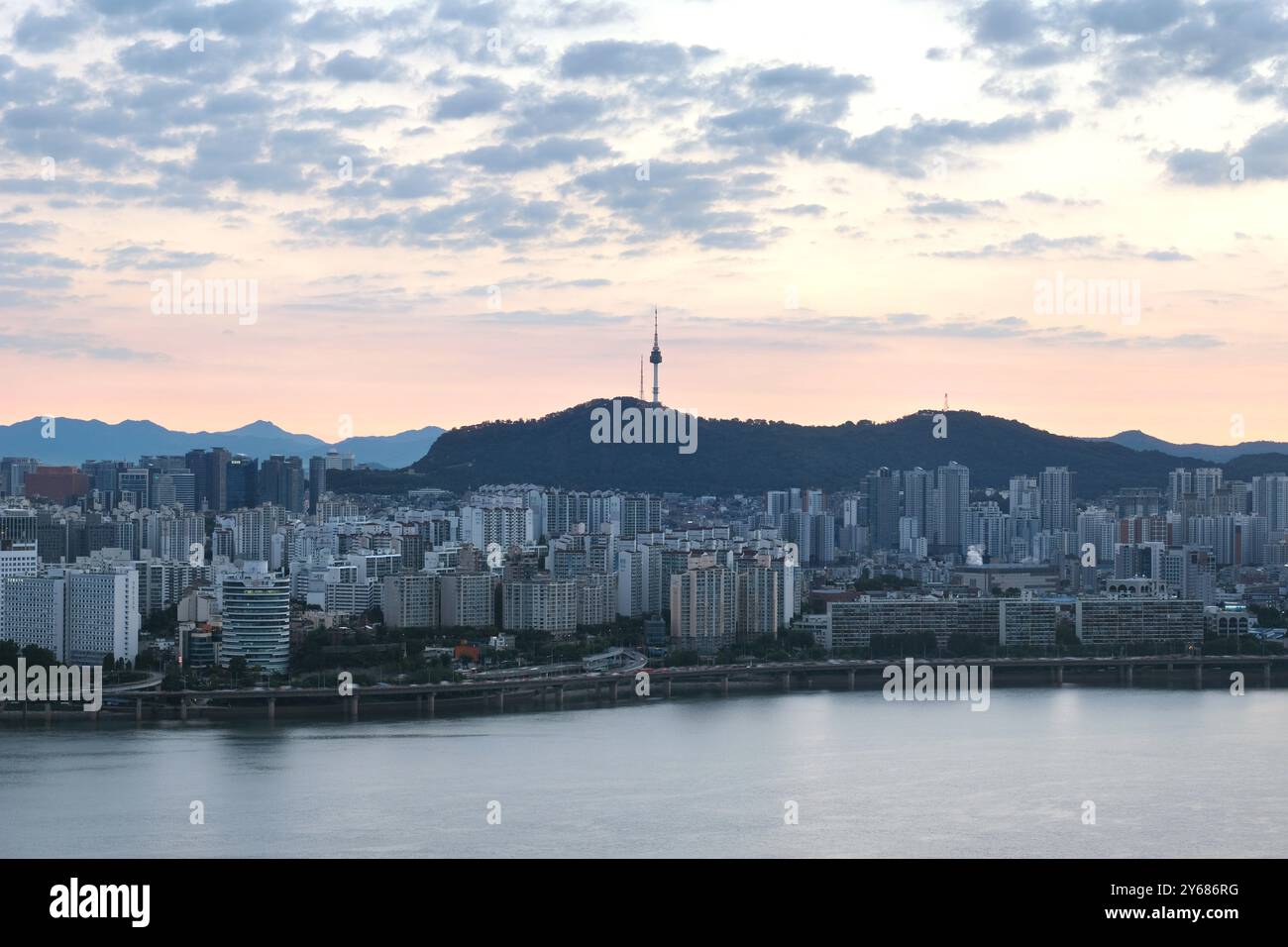 A panoramic view of Seoul cityscape with Namsan Seoul Tower at sunset ...