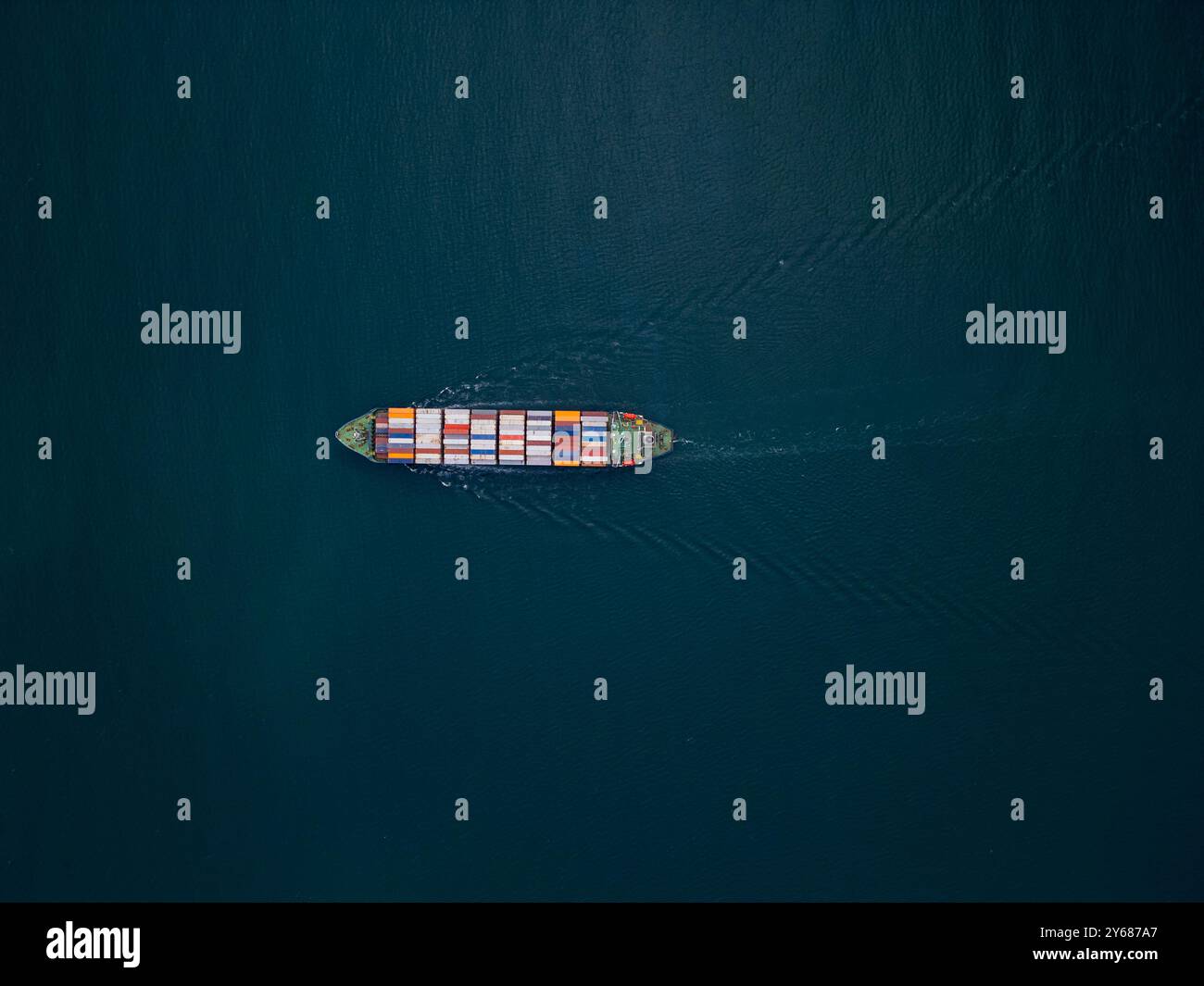 Cargo ship sails across ocean hi-res stock photography and images - Alamy