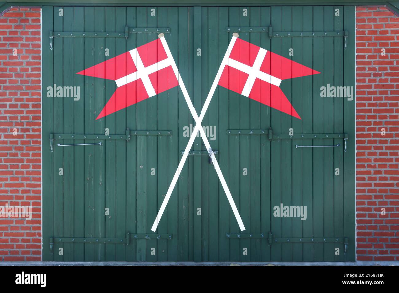 Door of a rescue station with Danish flags in Denmark Stock Photo - Alamy