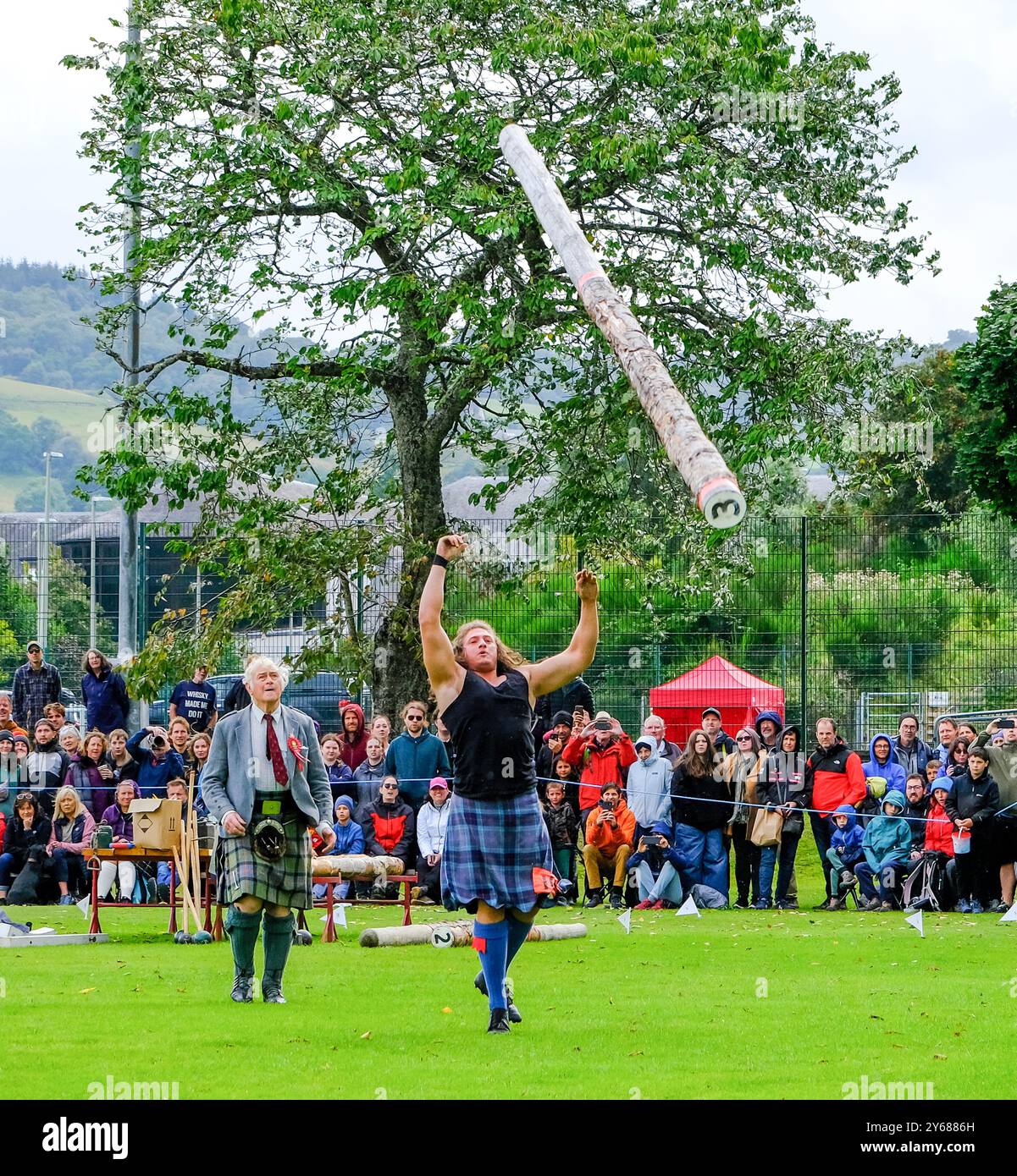 Tossing the caber at the Glenurquhart Highland Gathering and Games ...