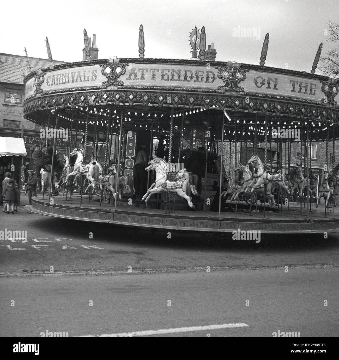 1950s, historical, funfair ride in town sqauare, England, UK Stock ...