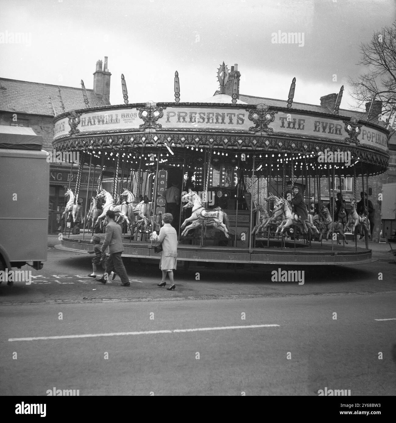 1950s, historical, funfair ride in town square, England, UK. All rides ...