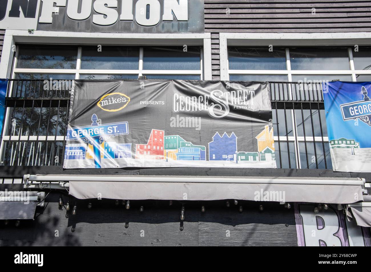 George Street Festival sign hanging on the railing at Konfusion pub on ...
