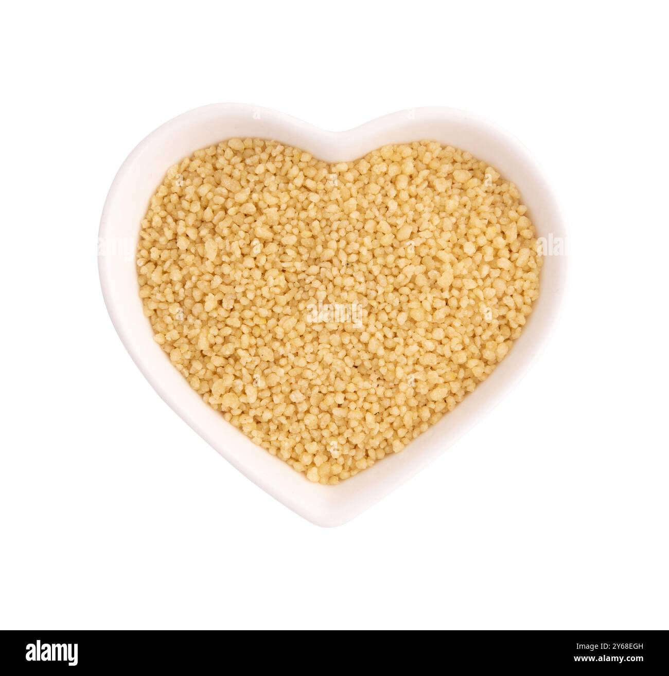 dry couscous in ceramic bowl isolated on white background with clipping ...