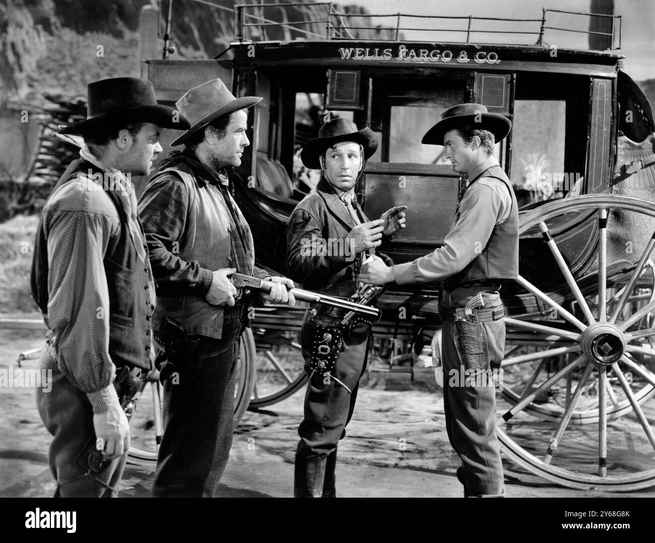 Ray Teal, Grant Withers, Lloyd Nolan, William Lundigan, on-set of the ...