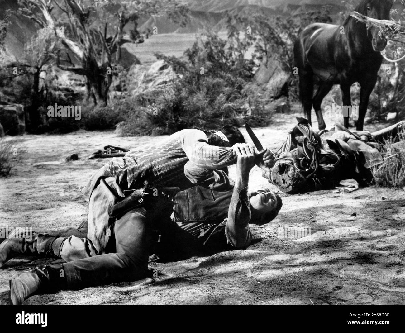 Rory Calhoun, on-set of the western film, "Apache Uprising", Paramount ...