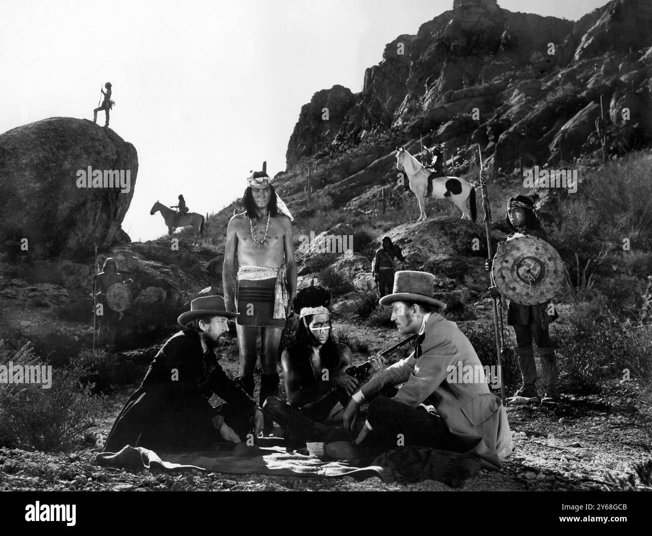 Porter Hall, Frank Hill, Warren William, on-set of the western film ...