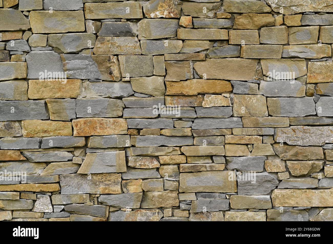 stone wall made of bricks Stock Photo - Alamy