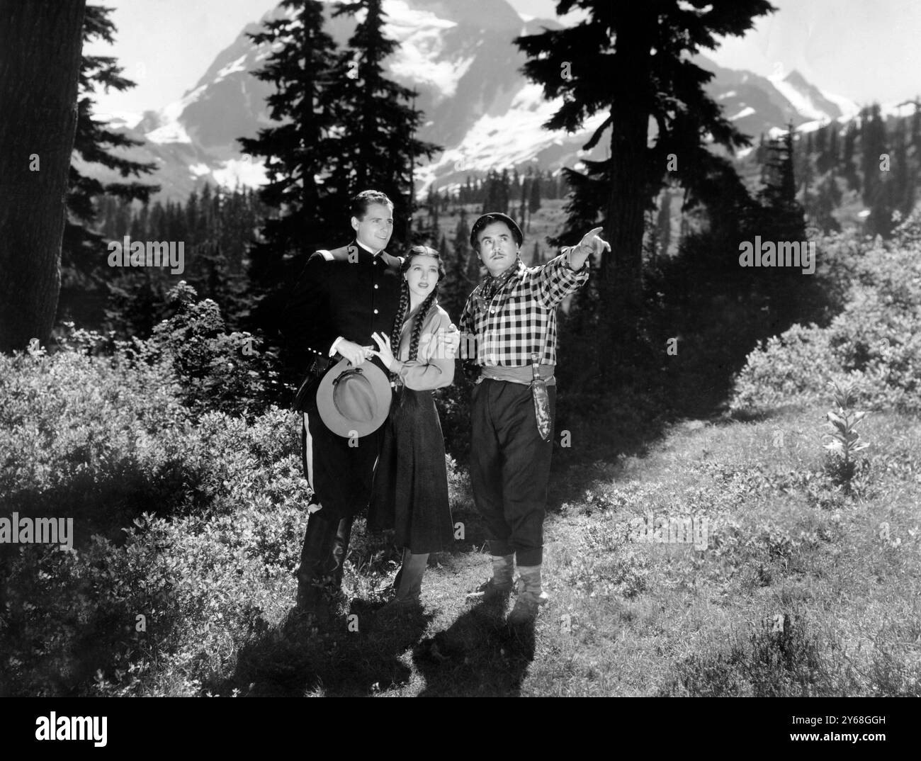 James Ellison, Jean Parker, Leo Carrillo, on-set of the western film ...