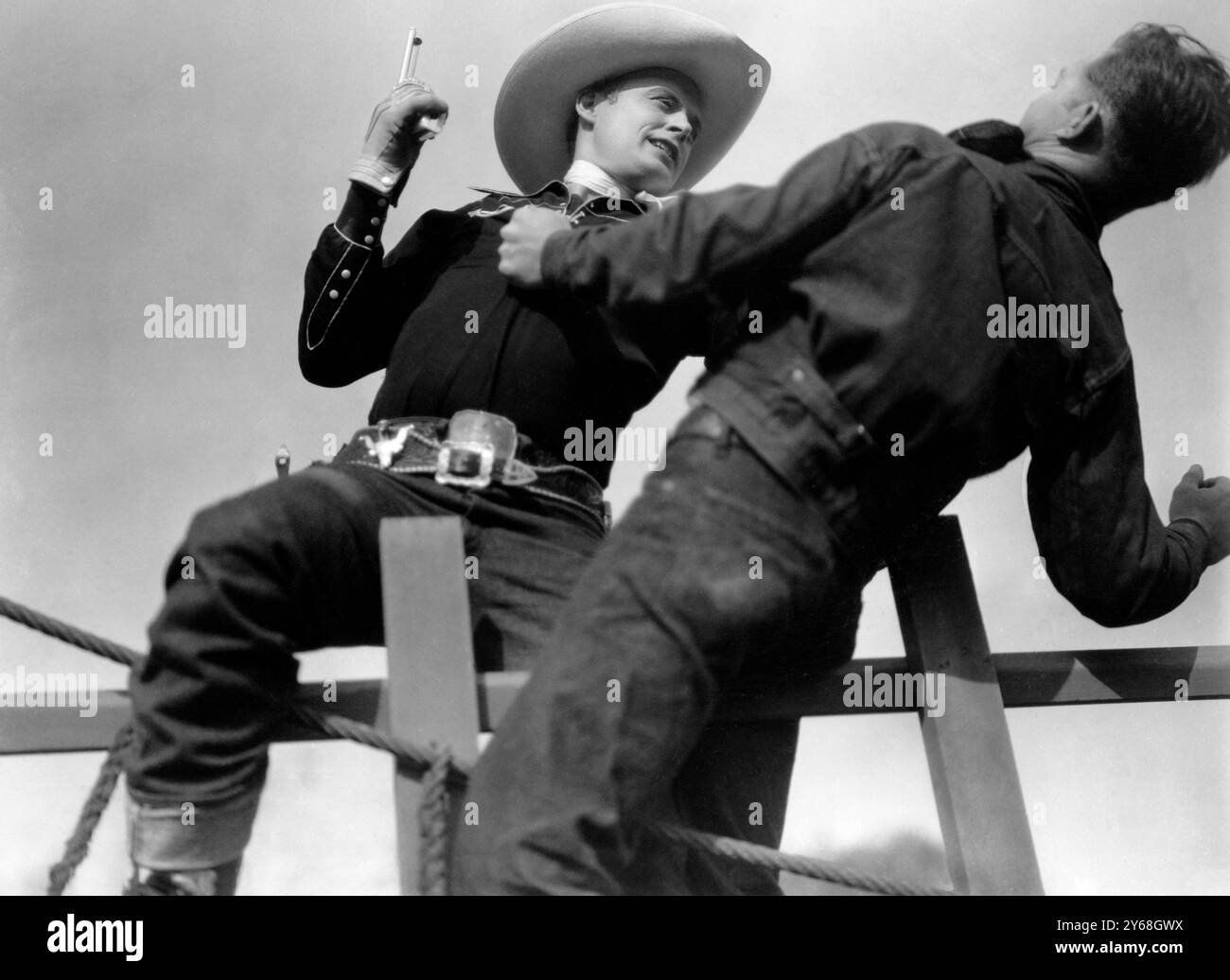 Bob Baker (left), on-set of the western film, "Border Wolves ...