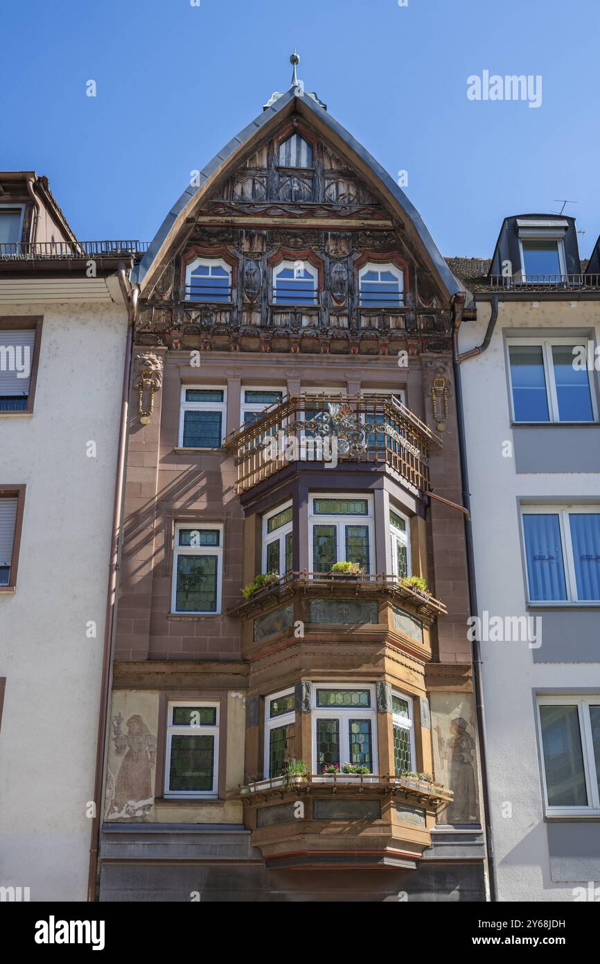 House facade, historic town house, town house with bay window in the ...