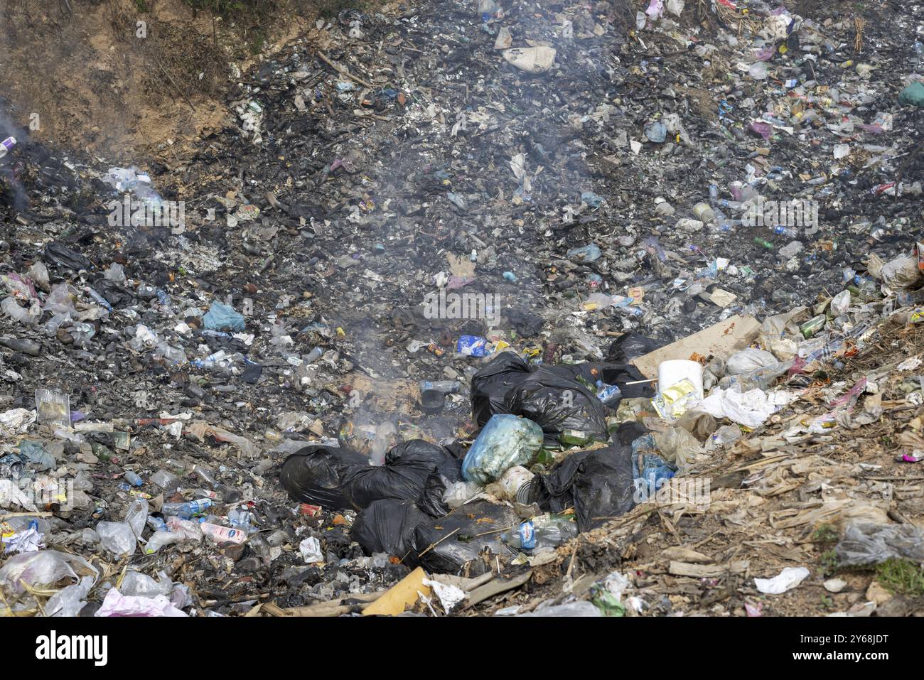Coking rubbish dump, rubbish pit with waste and plastic rubbish, karst ...