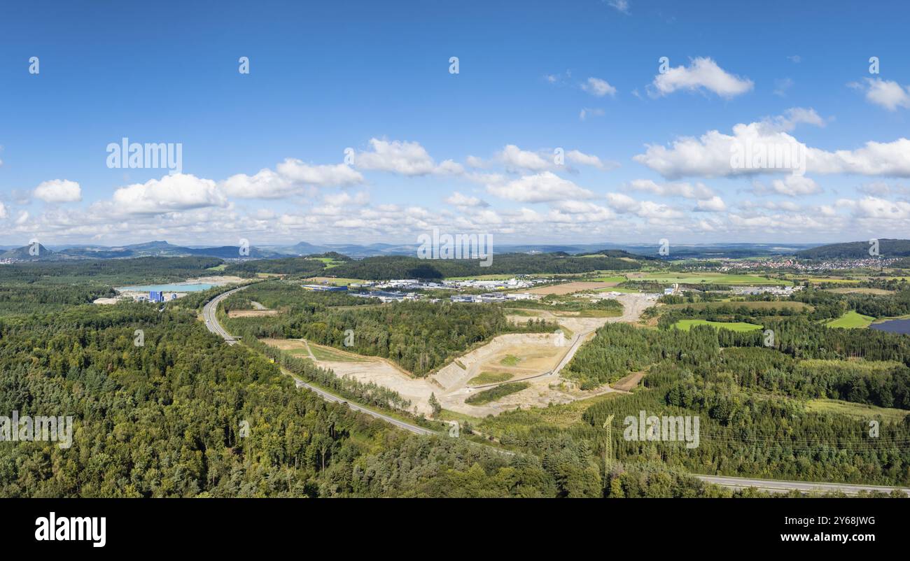 Aerial view, panorama of a gravel pit, gravel extraction area, raw ...