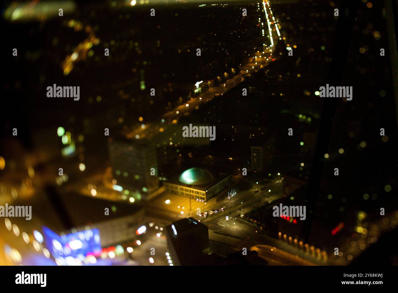 Discover the Alexanderplatz area in Berlin illuminated at night ...