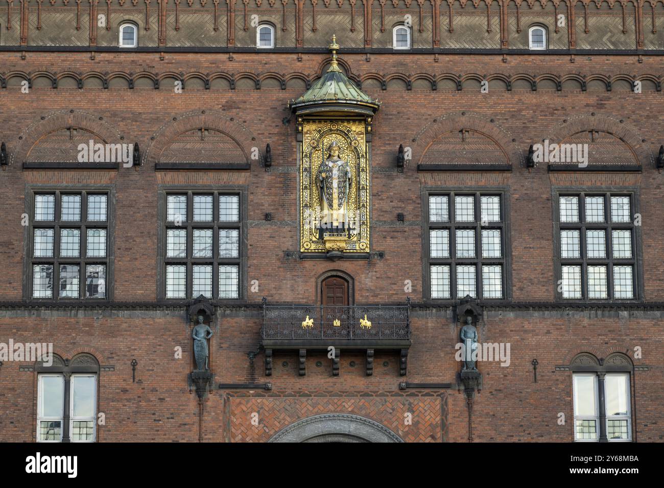 Brick facade with gilded sculpture of Bishop Absalon, Town Hall in the ...