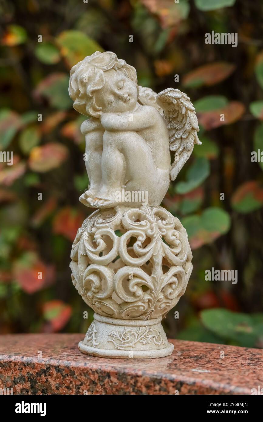 There are many beautiful little angel statues in the graves of the old ...