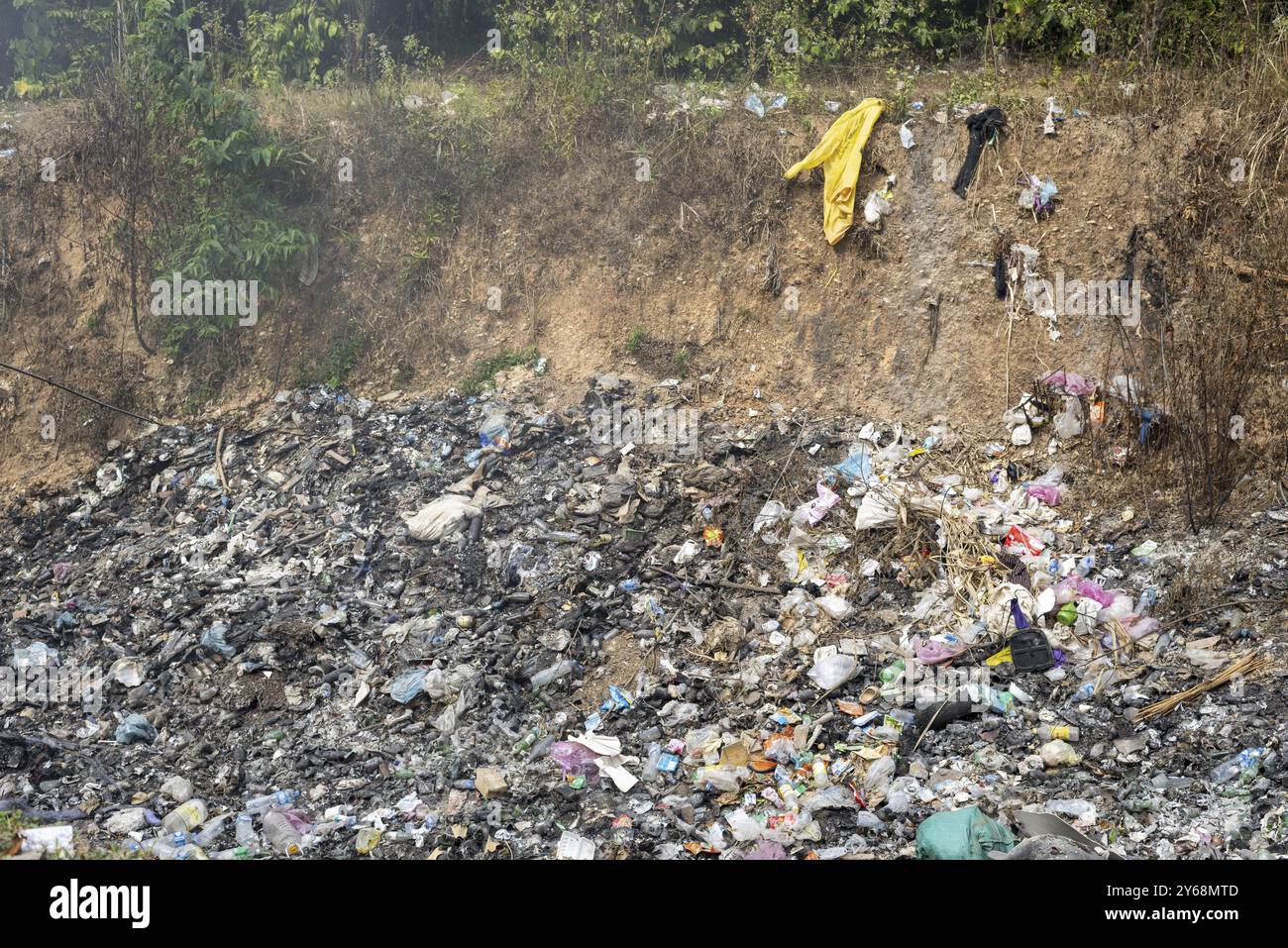 Coking rubbish dump, rubbish pit with waste and plastic rubbish, karst ...