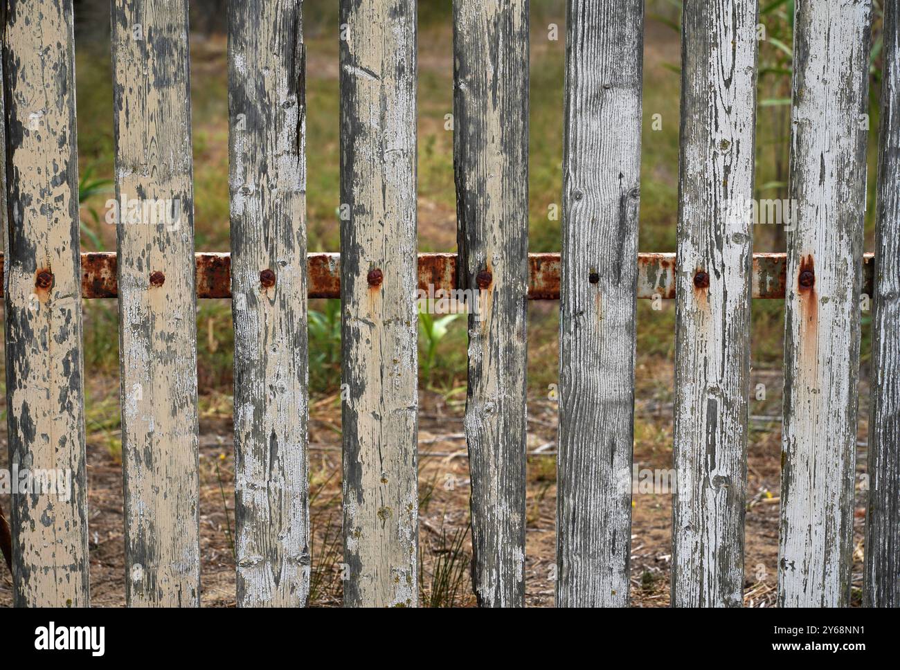 Old wooden fence with a lock in front Stock Photo - Alamy