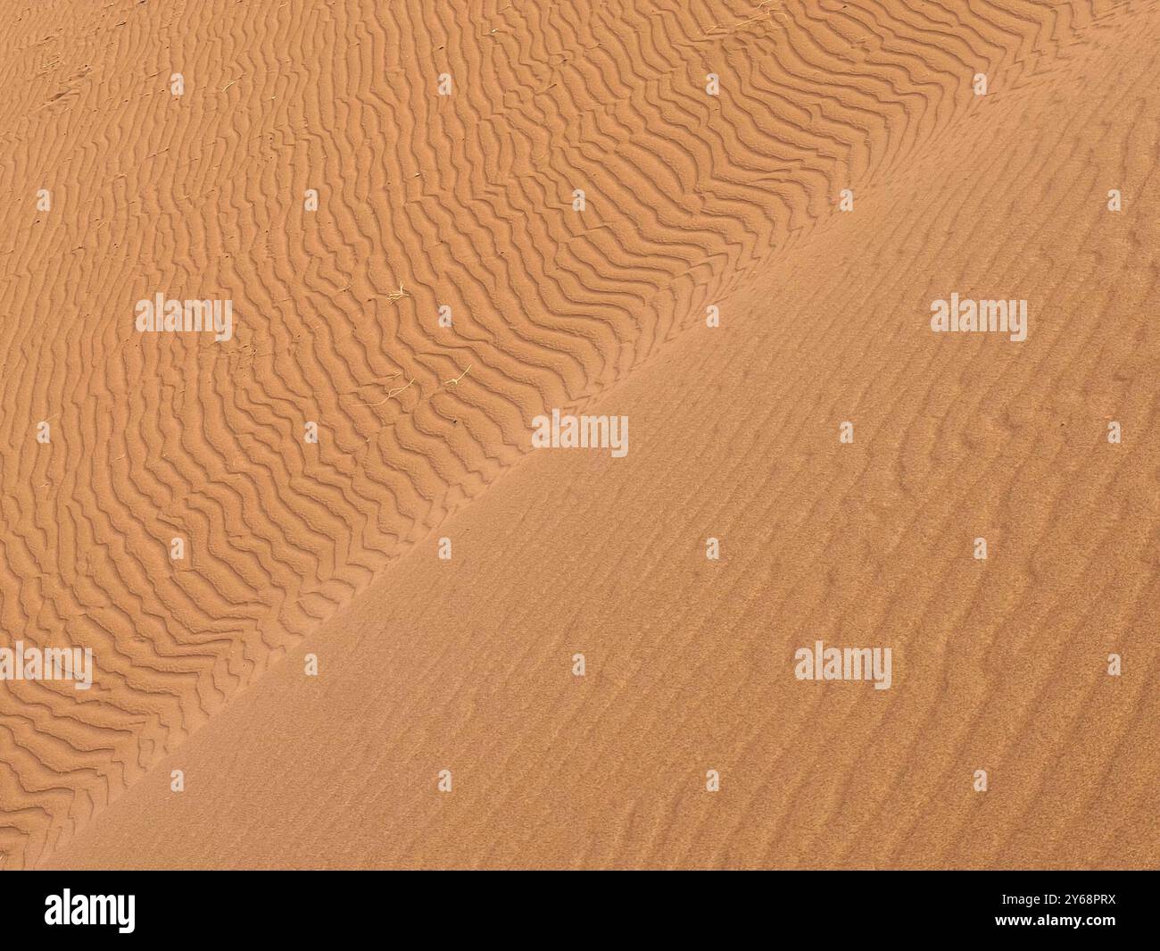 Yellow sand dune wavy pattern detail Stock Photo - Alamy