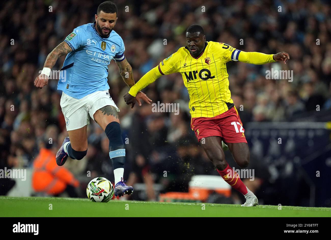 Manchester City's Kyle Walker and Watford's Ken Sema (right) during the ...
